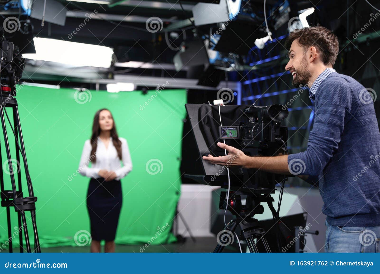 Presenter and Video Camera Operator Working. News Broadcasting Stock ...