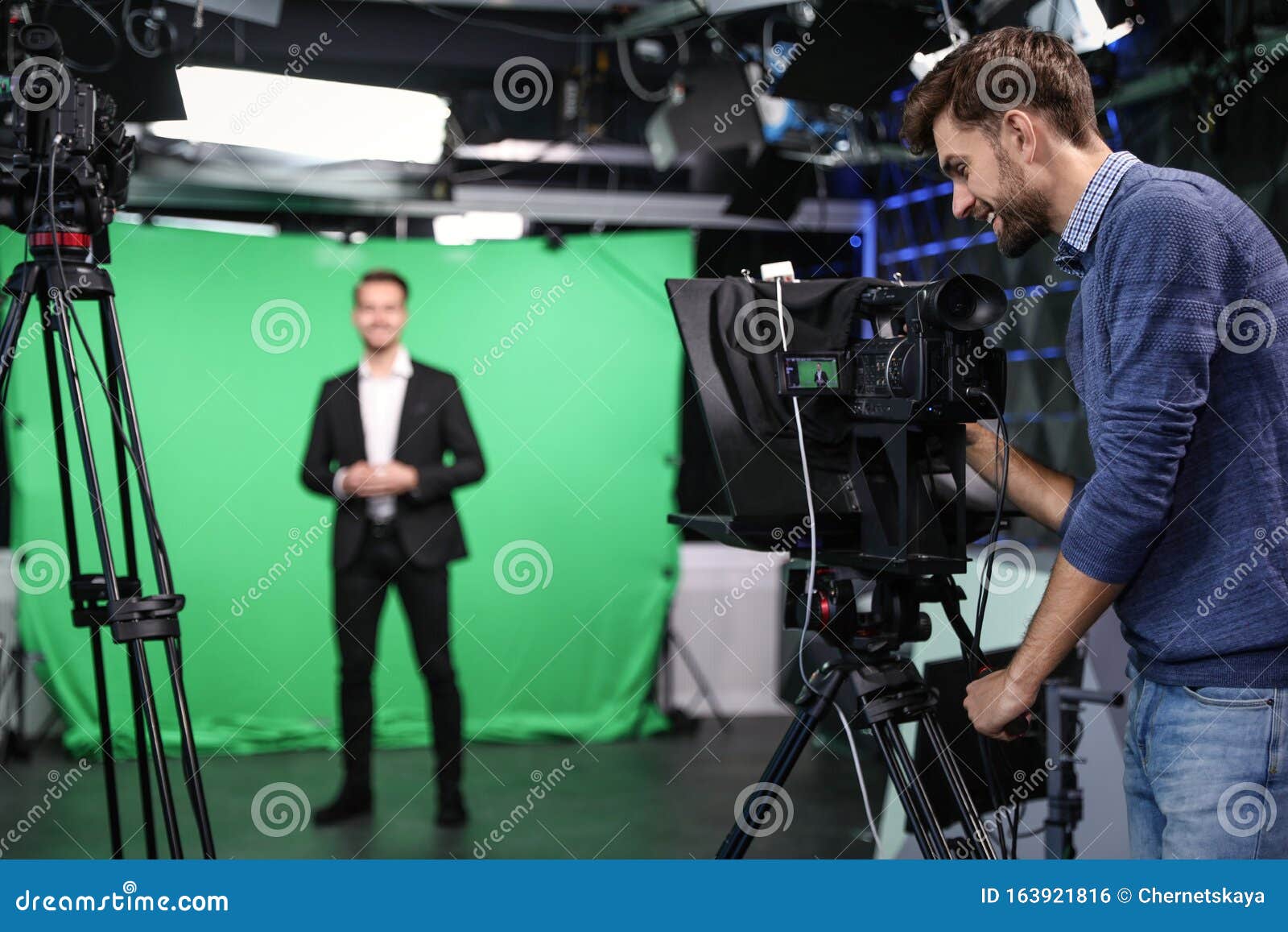 Presenter and Video Camera Operator Working. News Broadcasting Stock ...