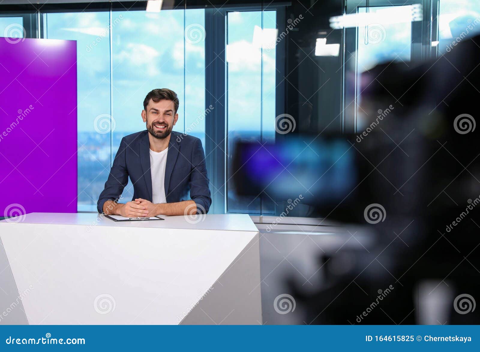 Presenter and Video Camera Operator Working. News Broadcasting Stock ...