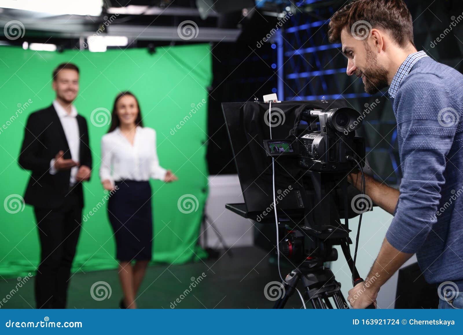 Presenters and Video Camera Operator Working. News Broadcasting Stock ...