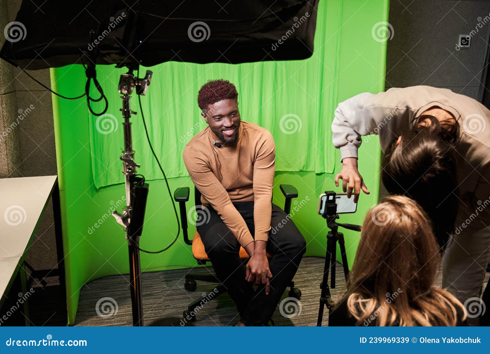 Presenters and Video Camera Operator Working in Studio Stock Image ...