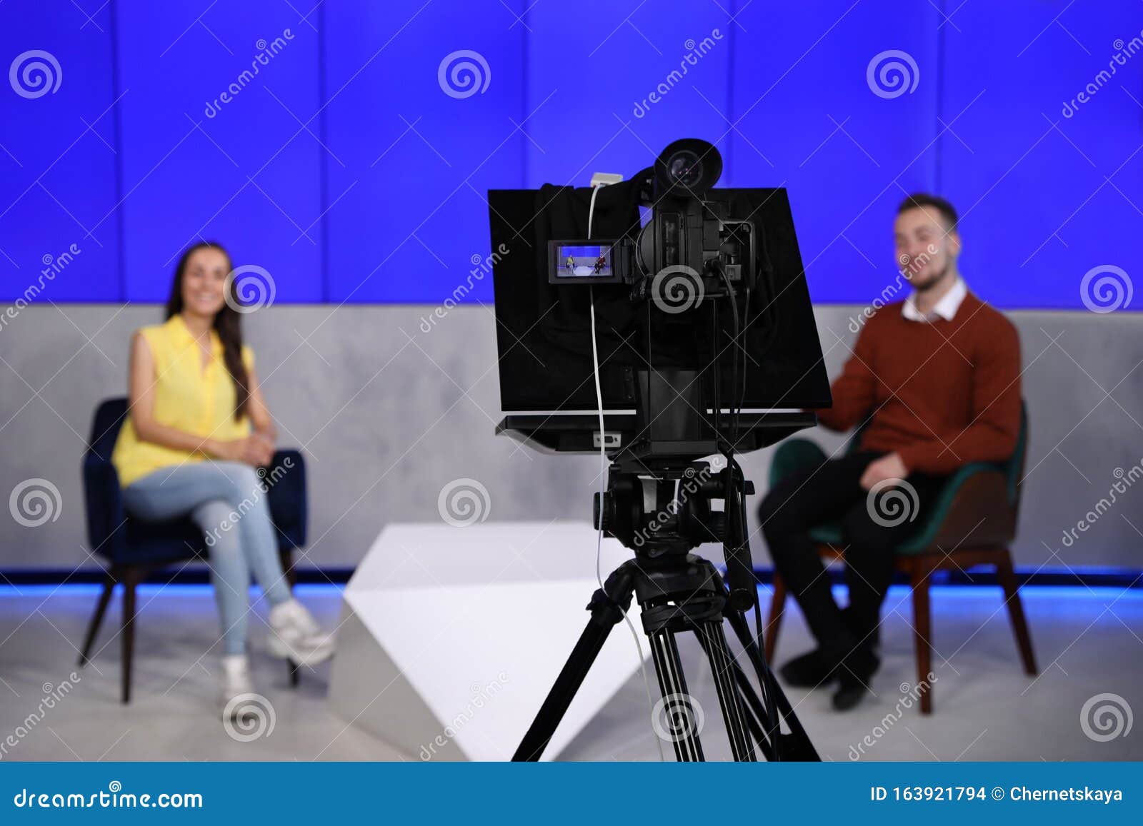 Presenters Working in Studio, Focus on Camera Stock Photo - Image of ...