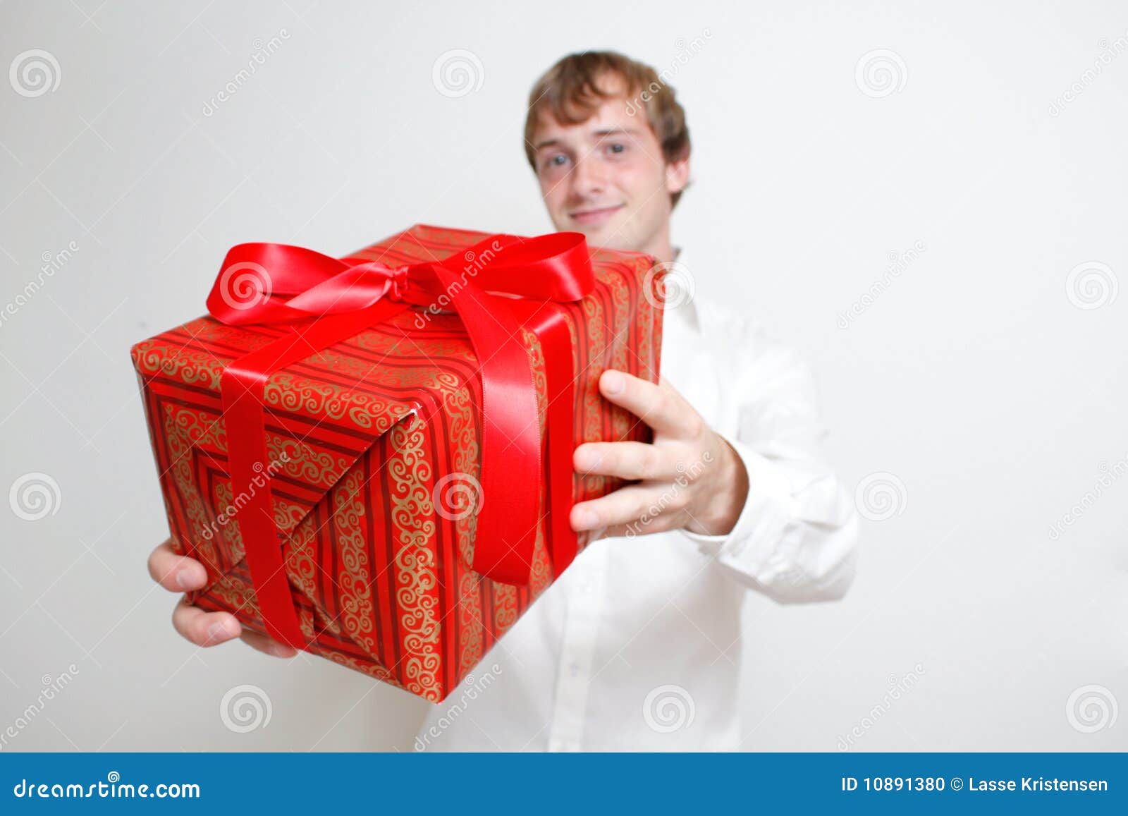 Presenting a gift stock photo. Image of studio, giving - 10891380