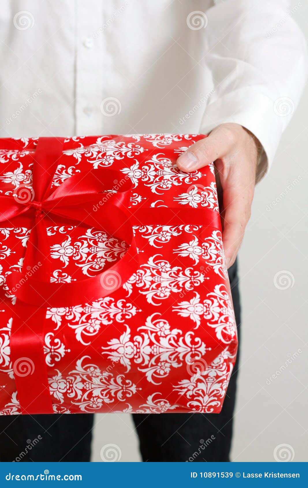 Presenting a gift stock image. Image of wrapped, deliver - 10891539