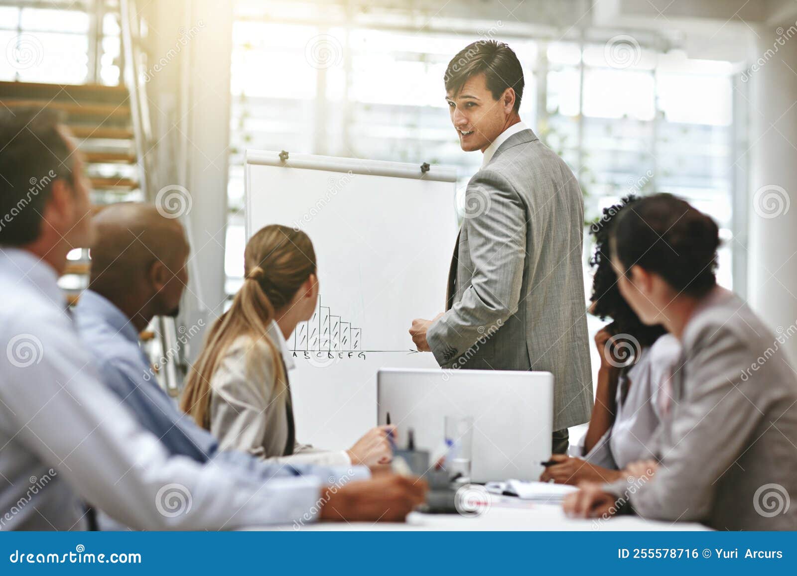 Presenting His Ideas. a Young Businessman Giving a Presentation. Stock ...