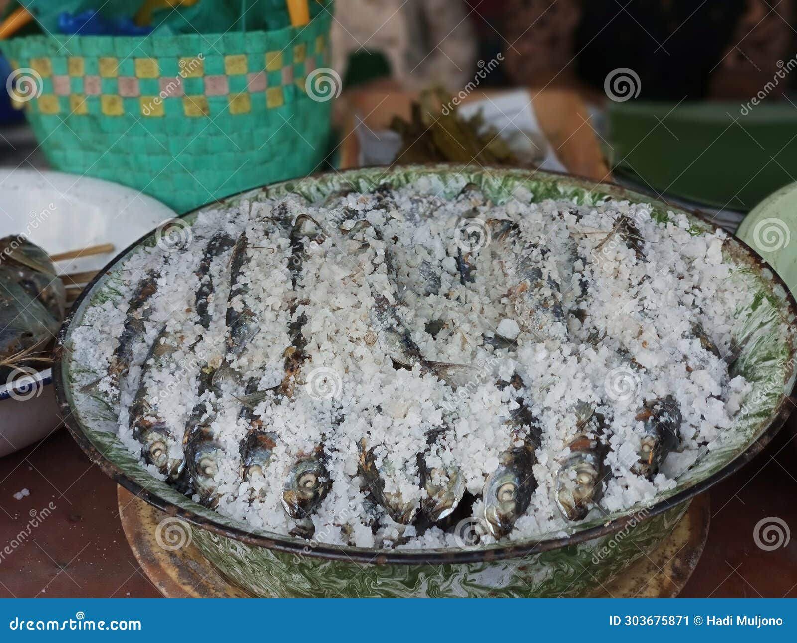 Preserving fish with salt stock image. Image of extension - 303675871