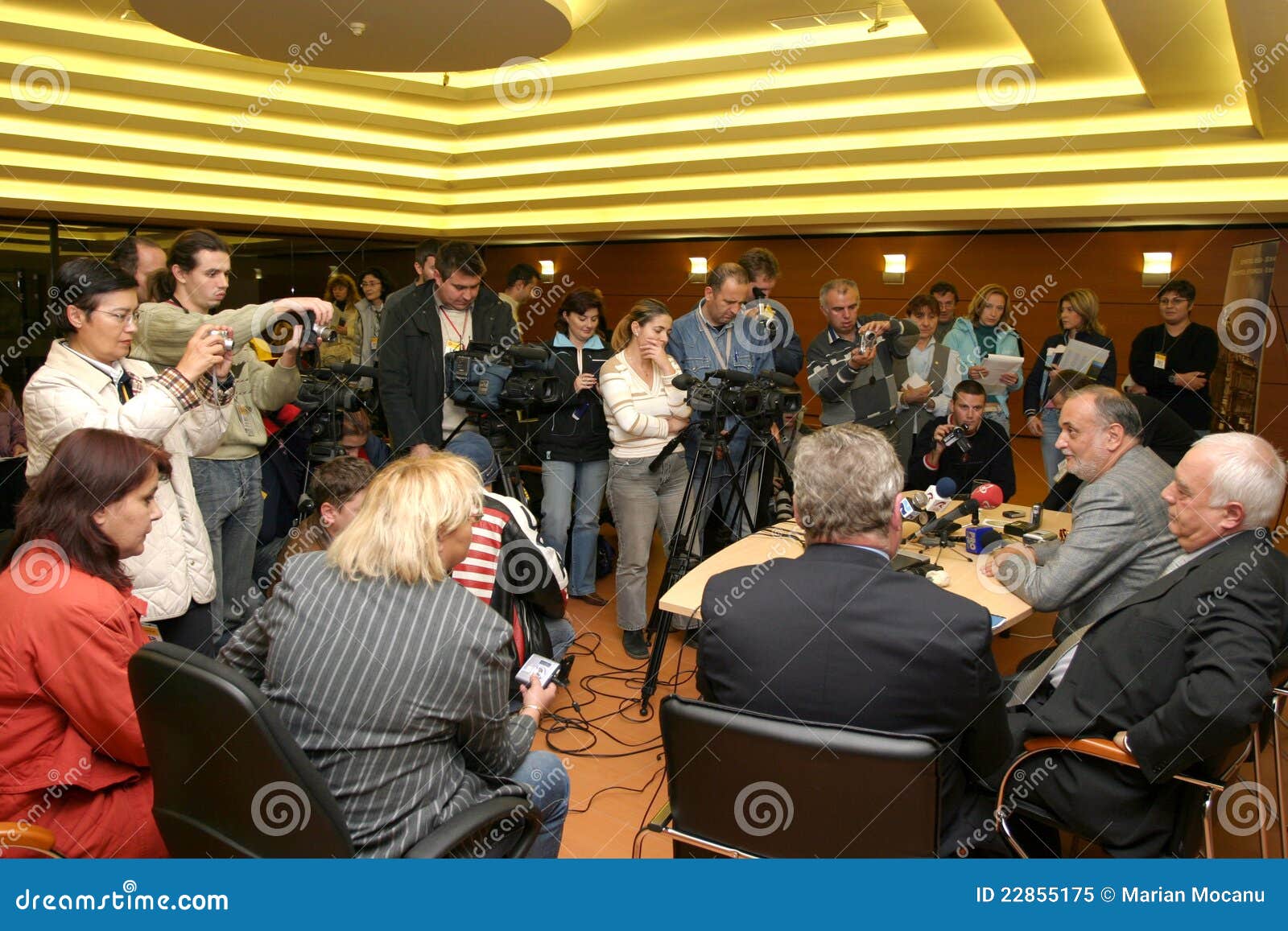 Press conference editorial image. Image of holding, microphone - 22855175
