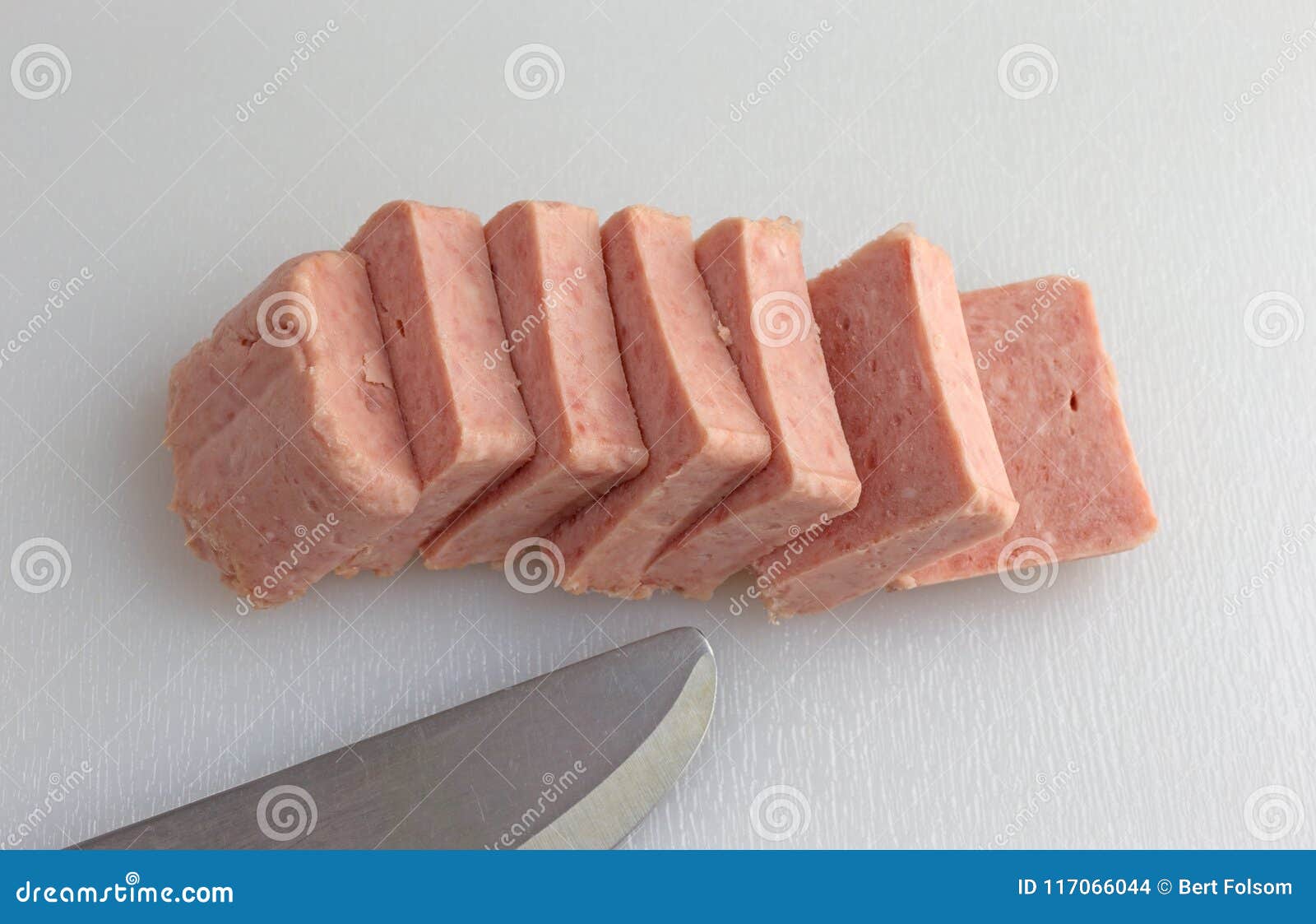 Pressed Pork Canned Meat Chunks on a Cutting Board with Knife. Stock ...