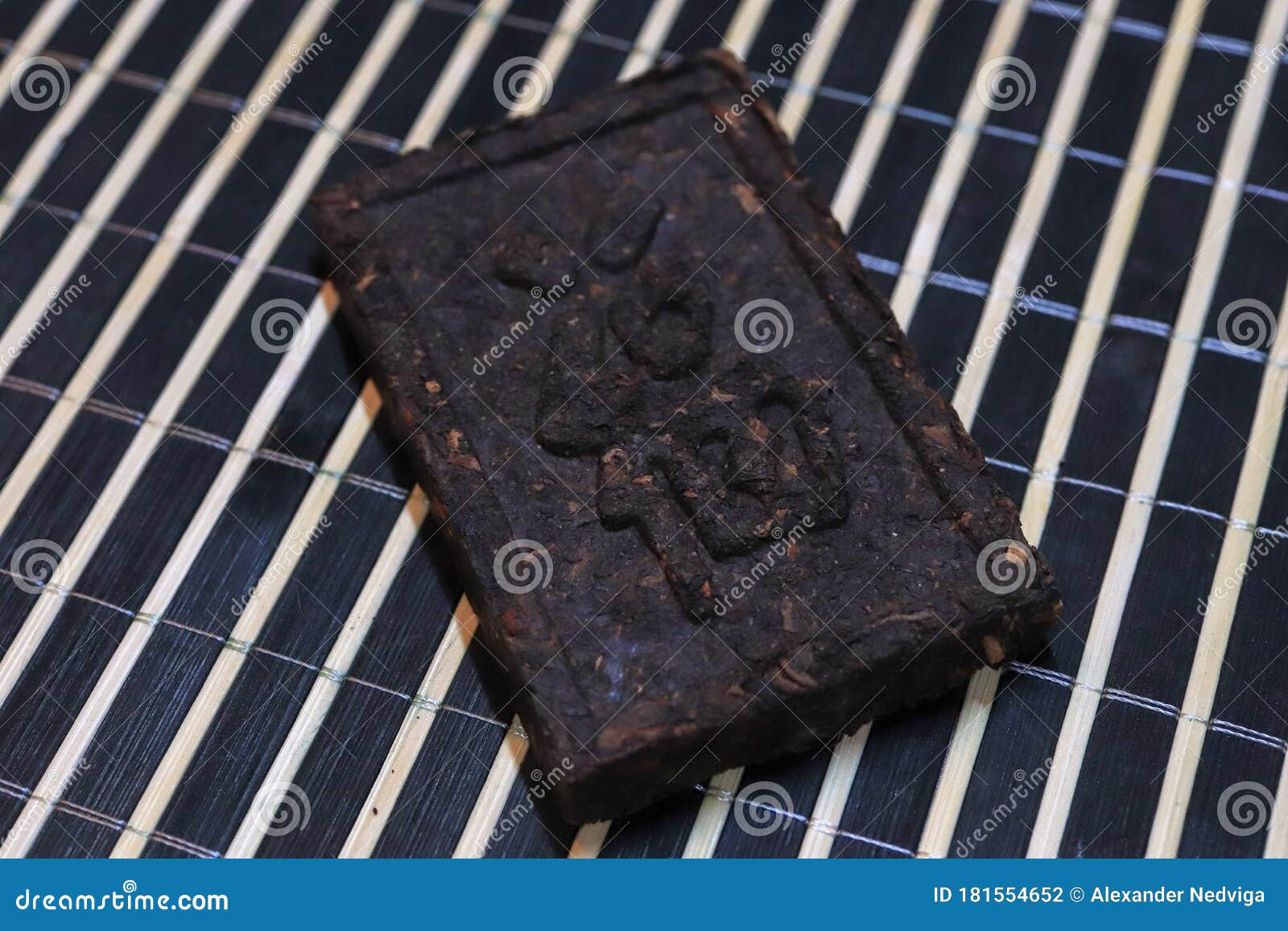 Pressed Tea Brick with Chinese Hieroglyphs. Stock Photo - Image of ...