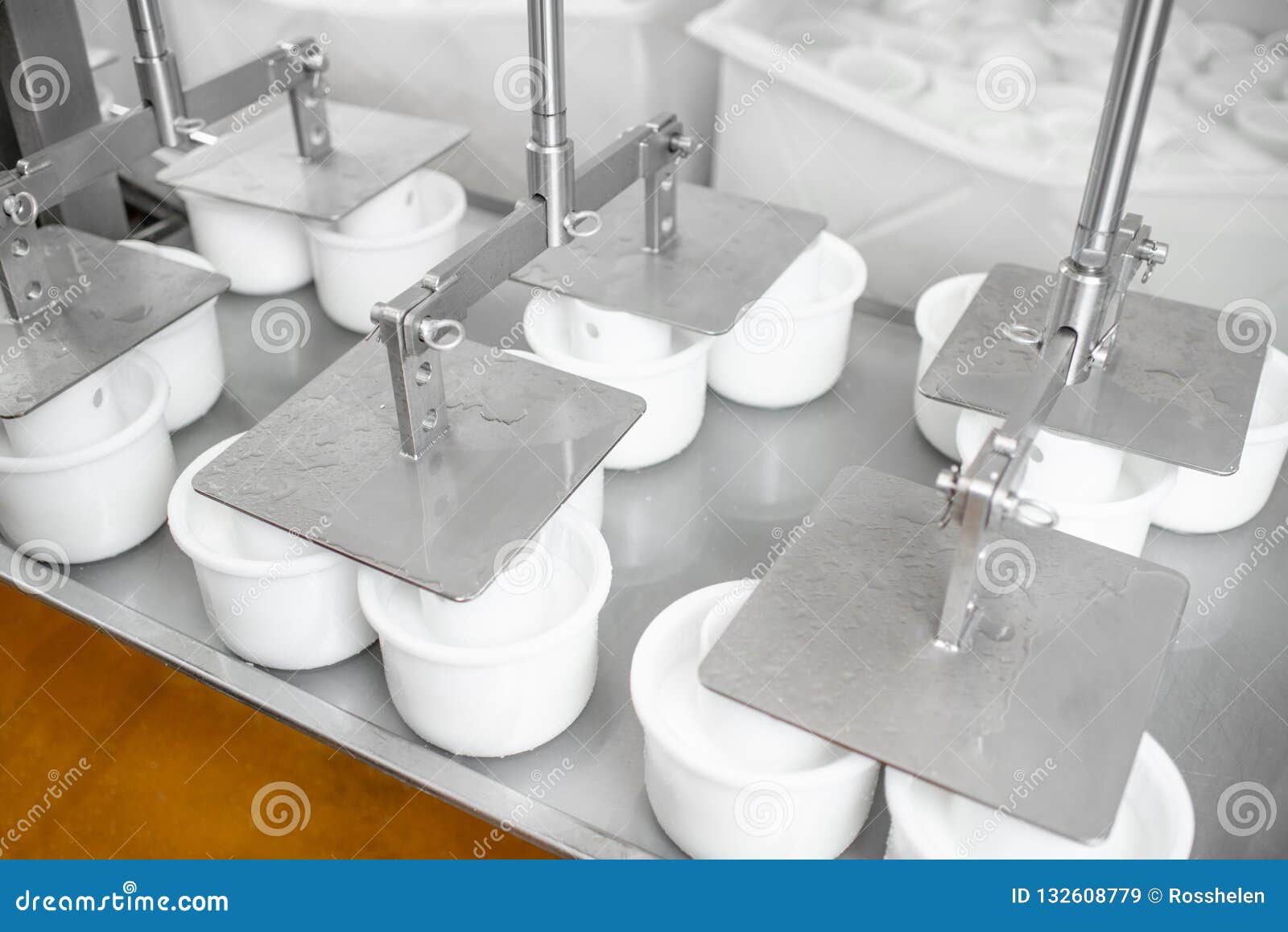 Pressing cheese stock image. Image of business, process - 132608779