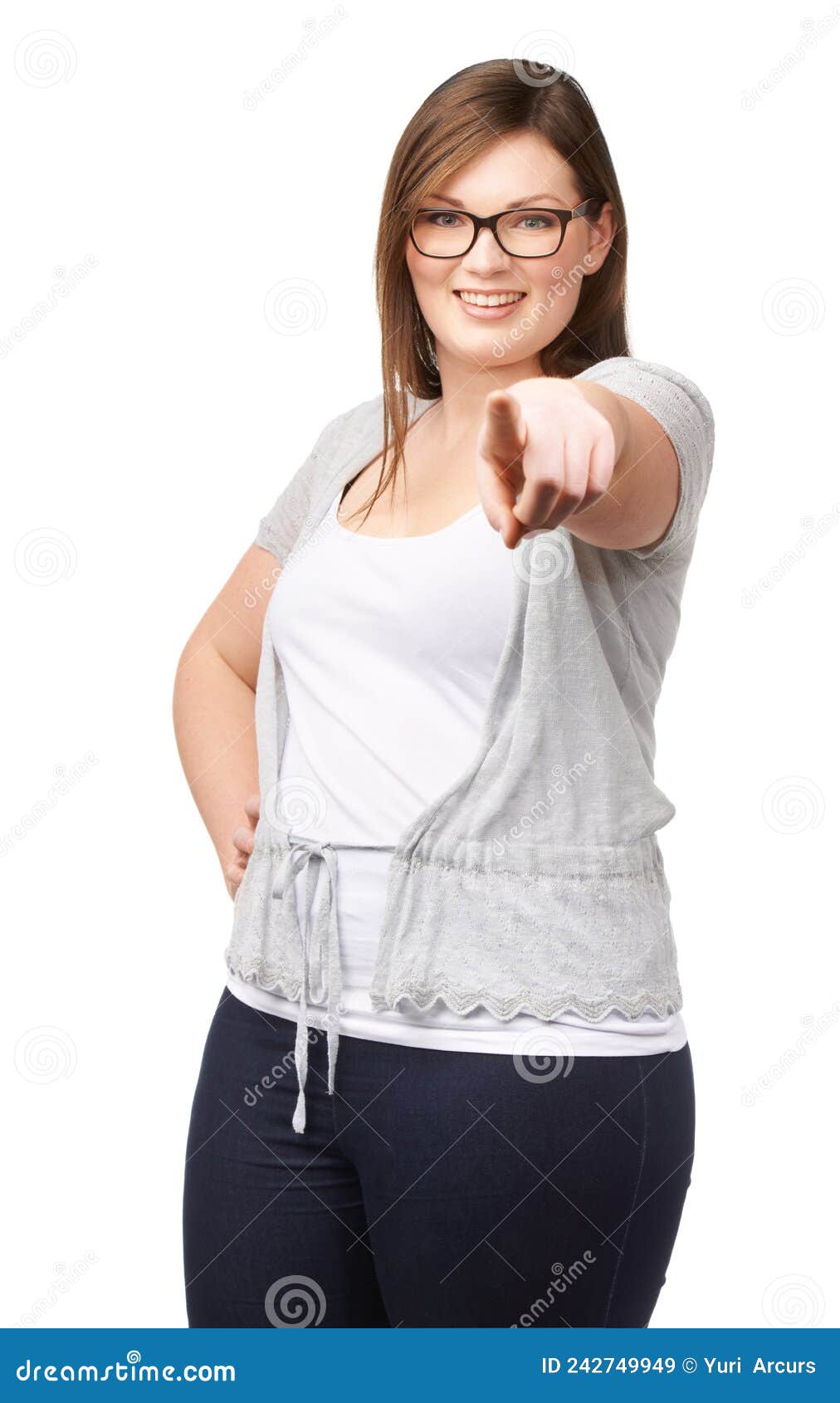 Pressing a Digital Interface. Studio Portrait of a Pretty Plus-size ...