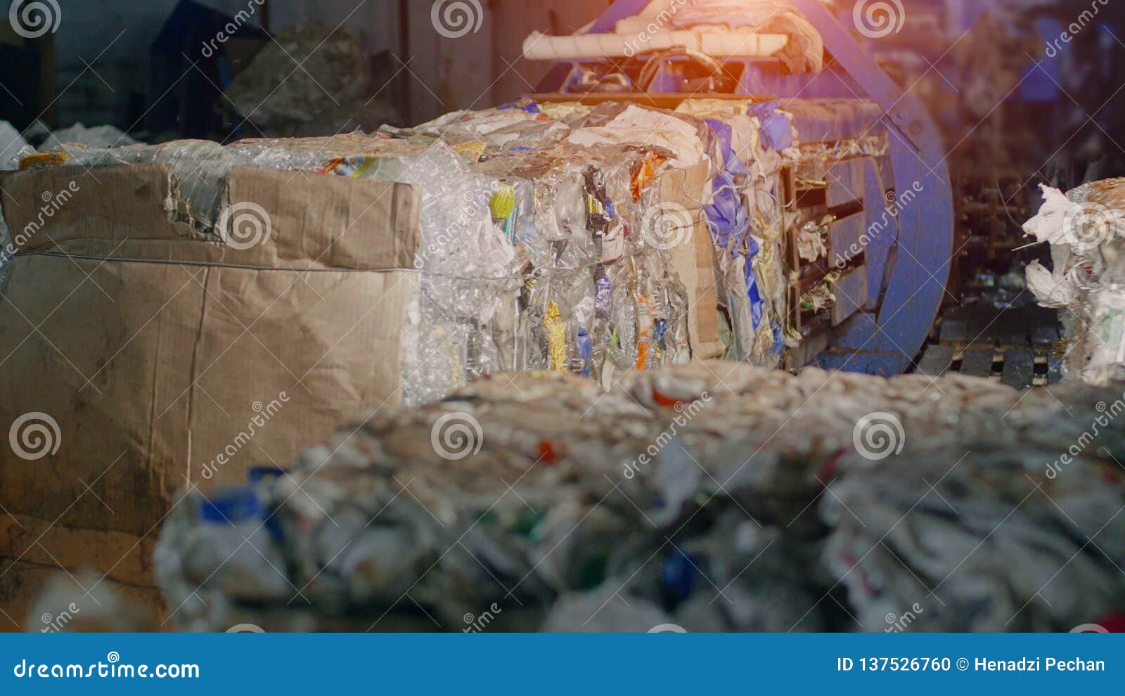 Pressing Garbage from Plastic Bottles on Special Equipment into Bales ...