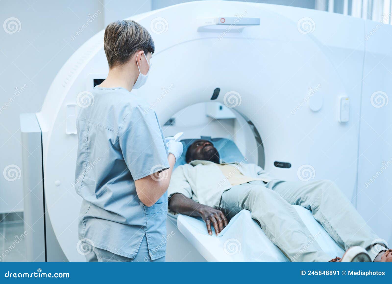 Pressing Start Button on Control Panel of MRI Scanner Stock Image ...