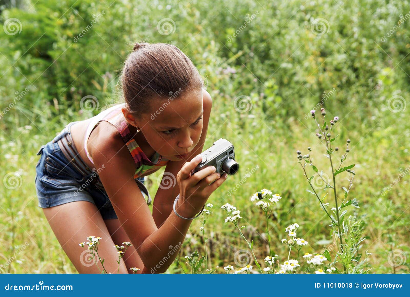 Preteen Girl with Digital Camera Stock Photo - Image of grass, girl ...