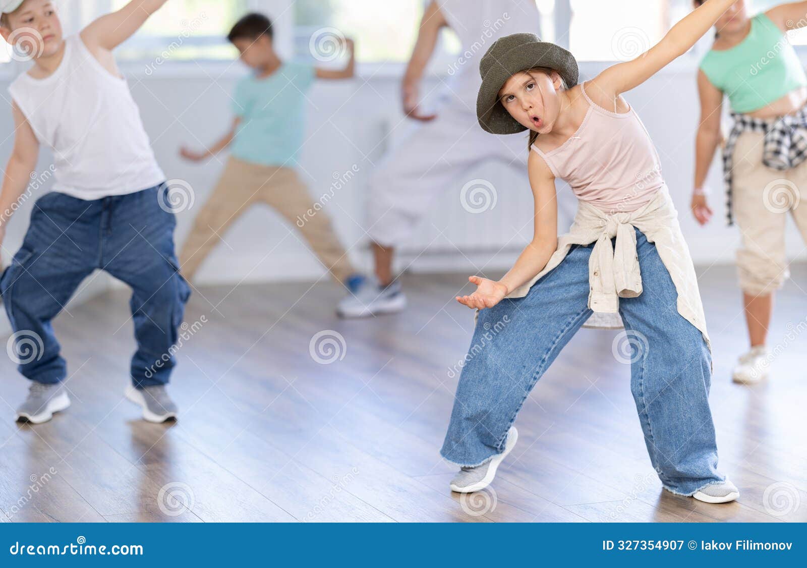 Preteen Girl Practicing Hip Hop Choreography with Peers and Instructor ... Preteen Girl Practicing Hip Hop Choreography with Peers and Instructor ...