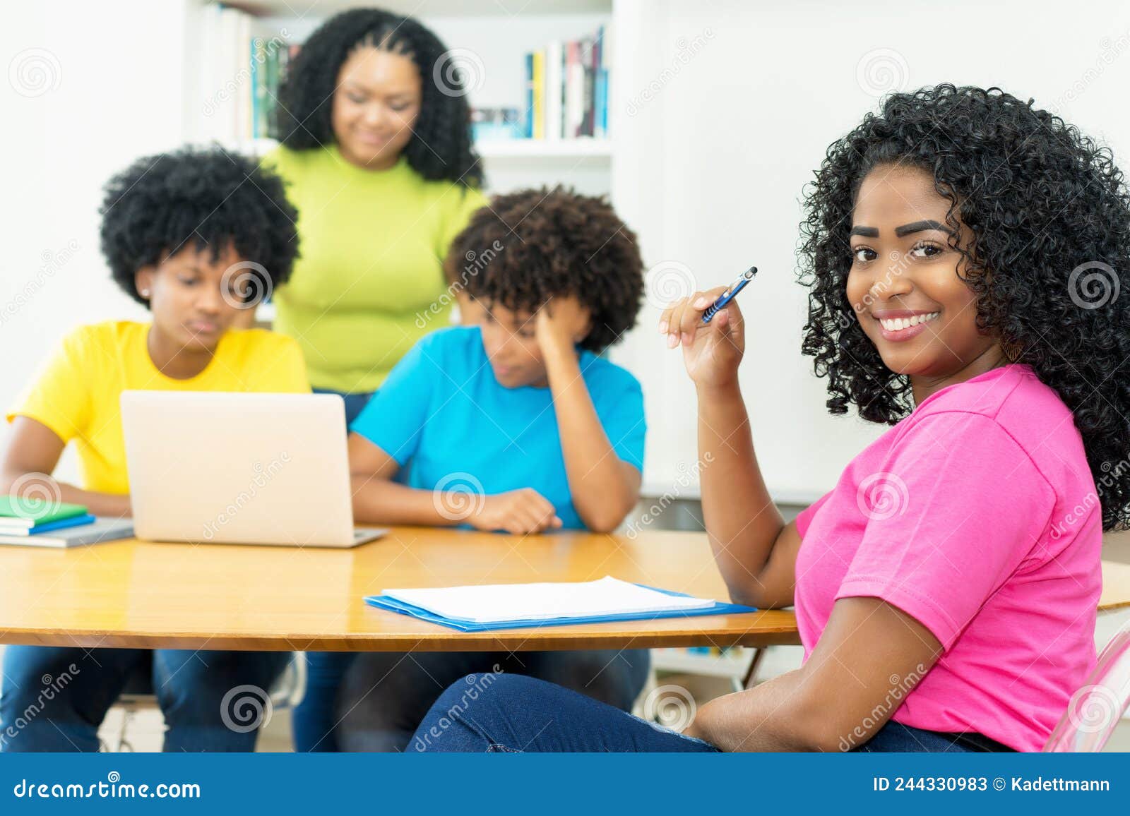 Pretty African American Computer Science Student with Group of Coding ...