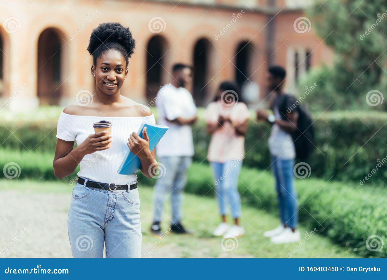 Pretty African Student Studying Outside on Campus at the University ...