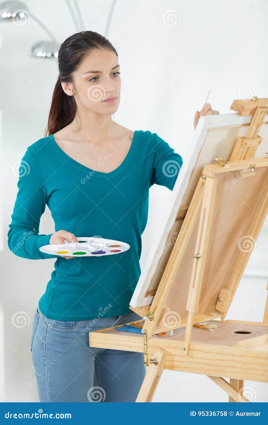 Pretty Artist Painting on Canva Stock Photo - Image of outdoors, human ...