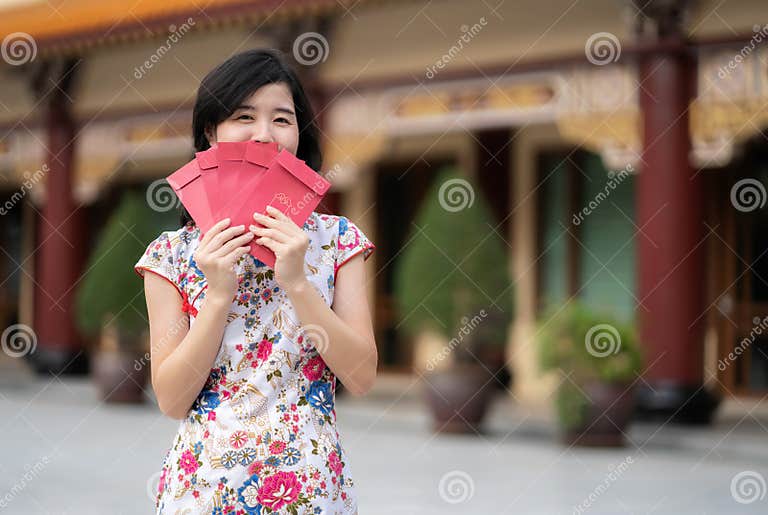 Pretty Asia Woman Wearing Chinese Traditional Dress Cheongsam Or Qipao