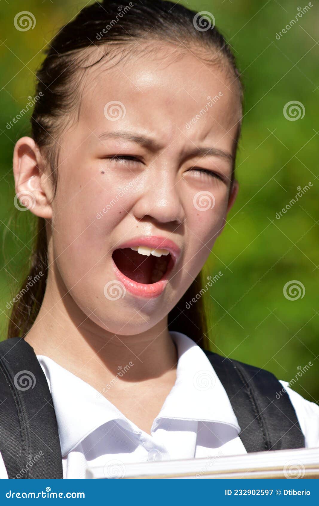 A Pretty Asian Female Student Yawning Stock Image - Image of cute, yawn ...