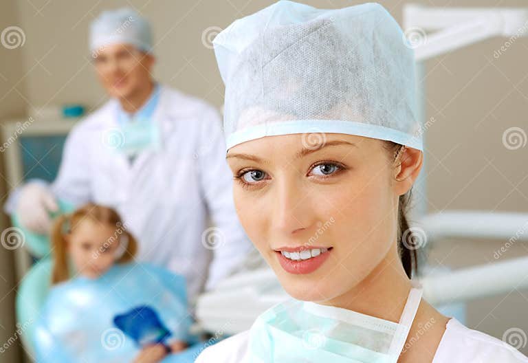 Pretty assistant stock image. Image of gloved, beautiful - 17330497