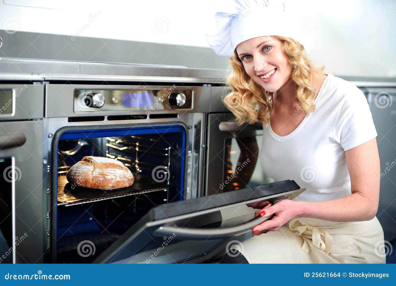 Pretty Baker Opening an Oven Door Stock Photo - Image of confident ...