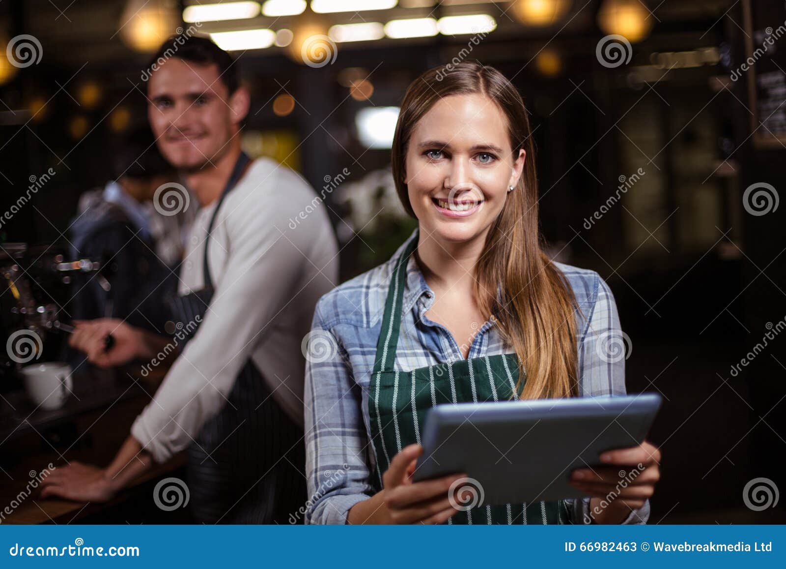 Pretty Barista Using Tablet Stock Image - Image of happy, camera: 66982463