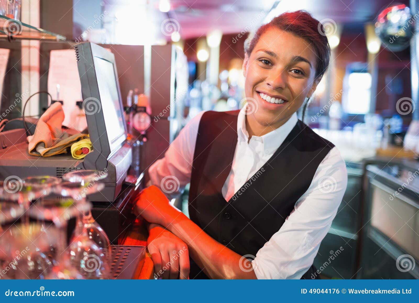 Pretty Barmaid Smiling at Camera Stock Photo - Image of waistcoat ...