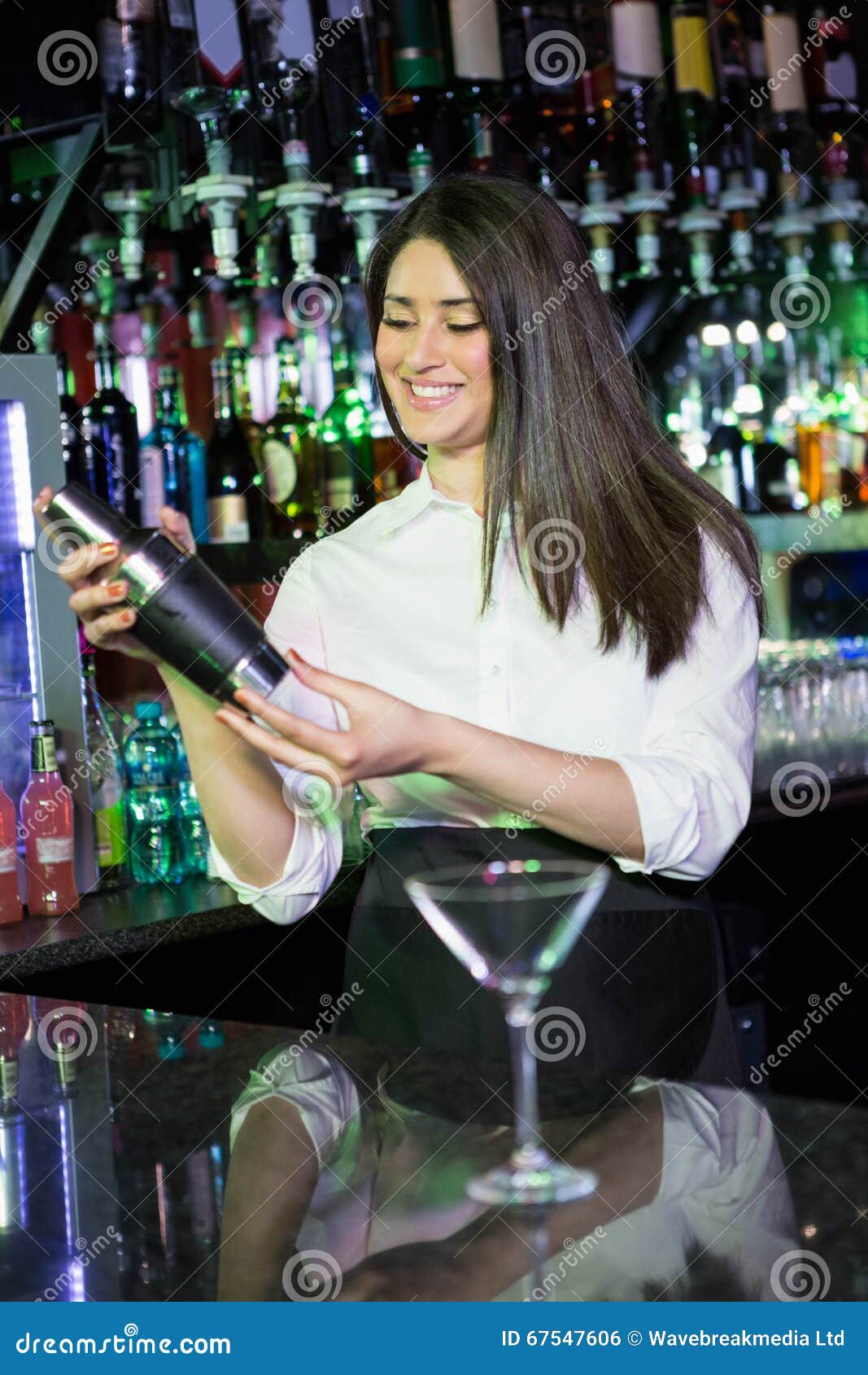 Pretty Bartender Mixing a Cocktail Drink in Cocktail Shaker Stock Photo ...