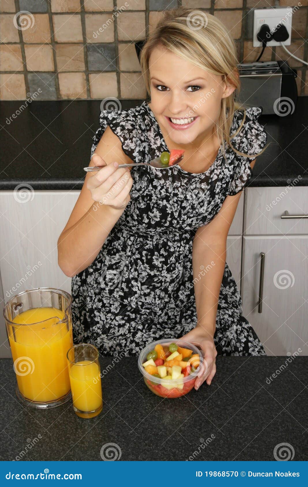 Pretty Blond Woman Eating Breakfast Stock Photo - Image of cheerful ...
