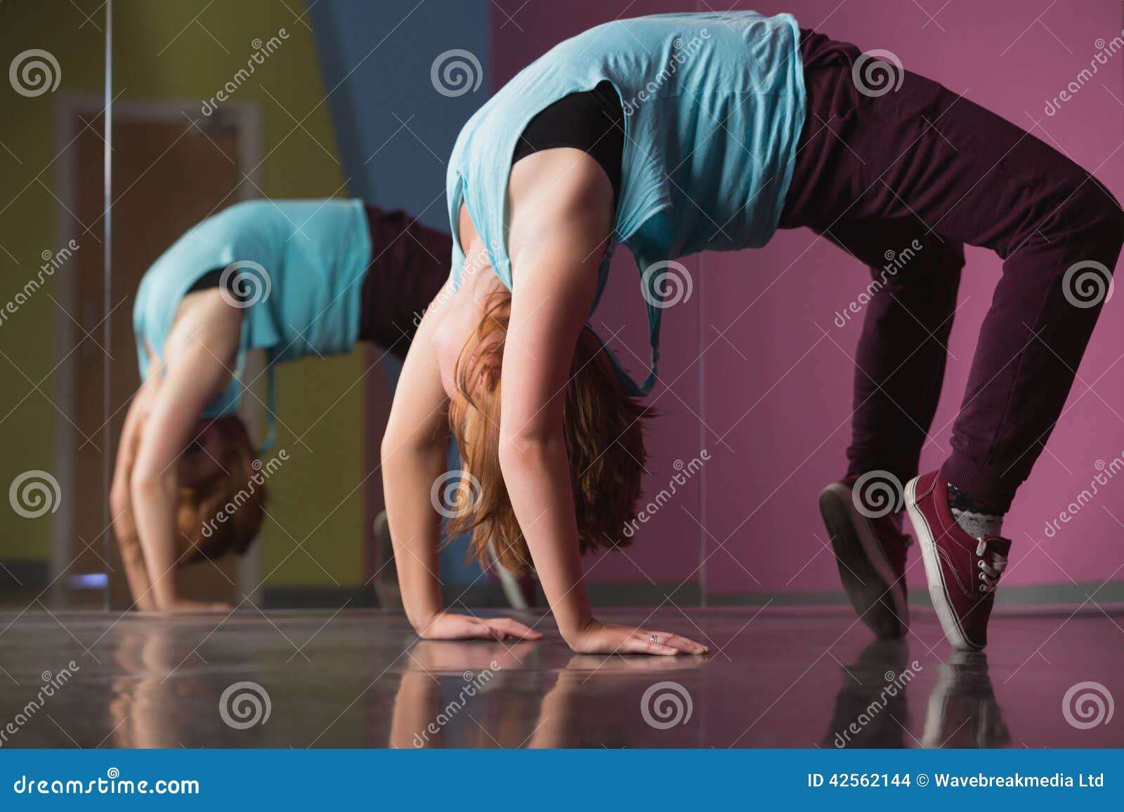 Pretty Break Dancer Doing a Back Bend Stock Photo - Image of dancer ...