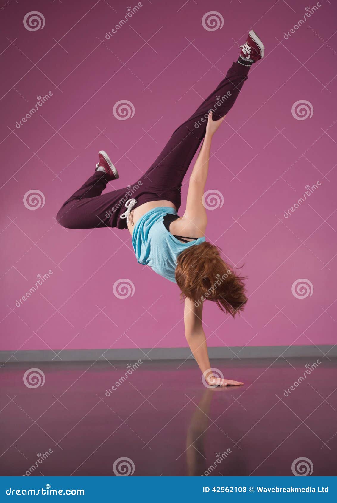 Pretty Break Dancer Doing Handstand with One Hand Stock Photo - Image ...