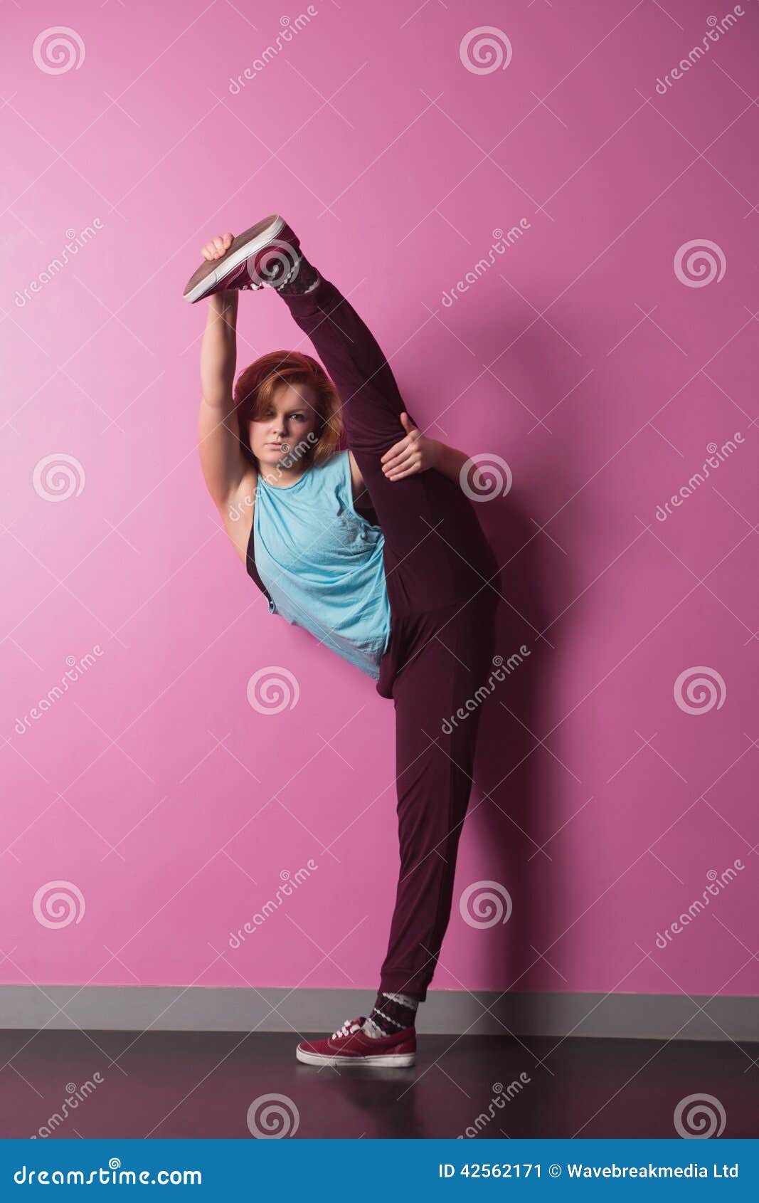 Pretty Break Dancer Lifting Her Leg Above Head Stock Image - Image of ...