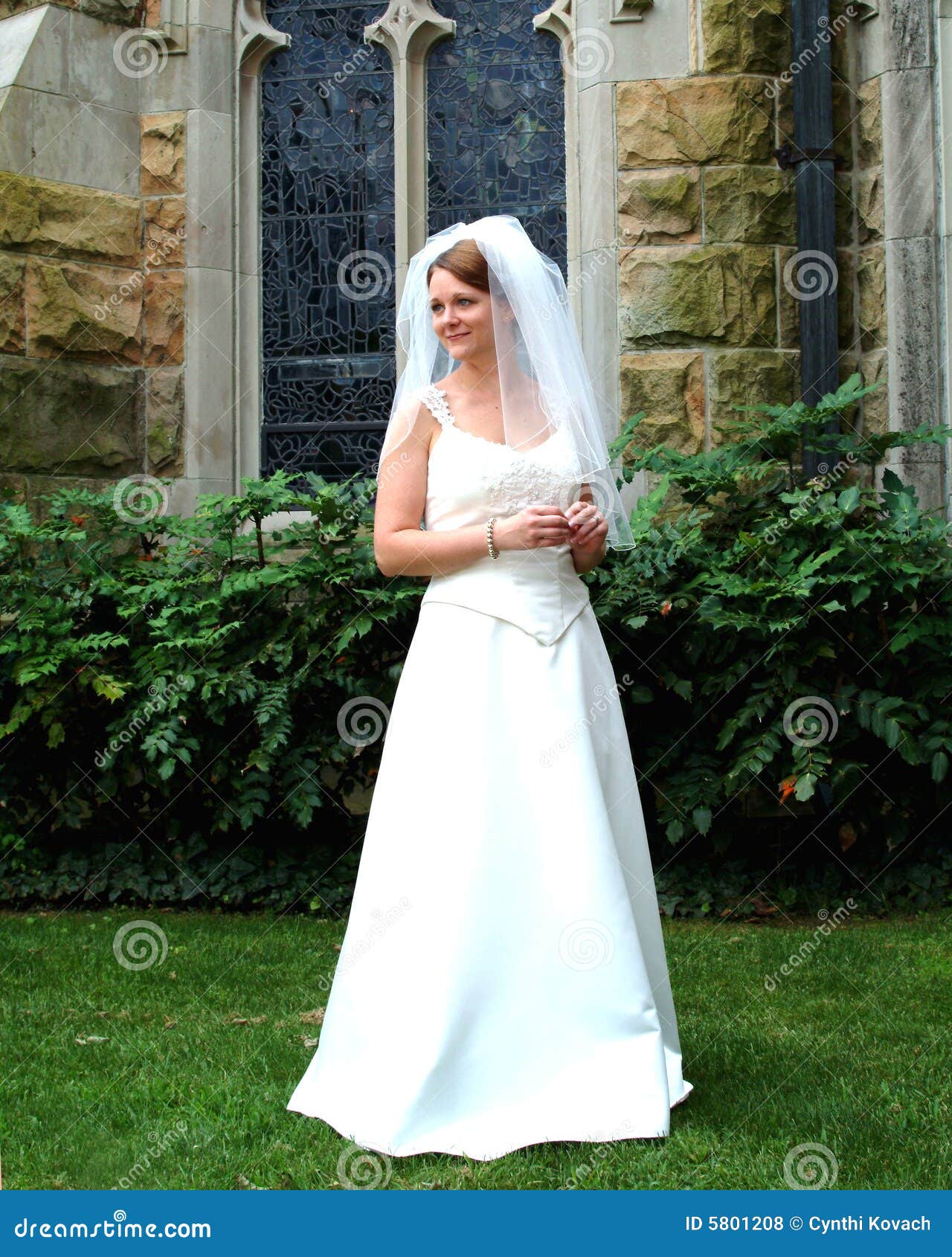 Pretty Bride on Lawn of Church Stock Photo - Image of rock, female: 5801208
