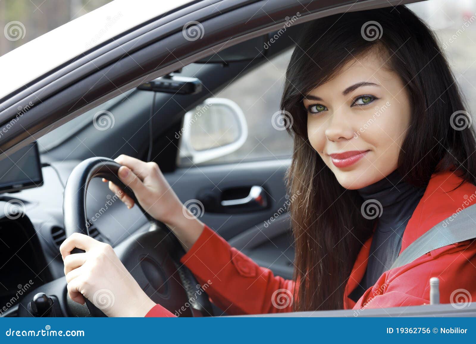 Pretty Brunette Driving a Car Stock Photo - Image of automobile, girl ...
