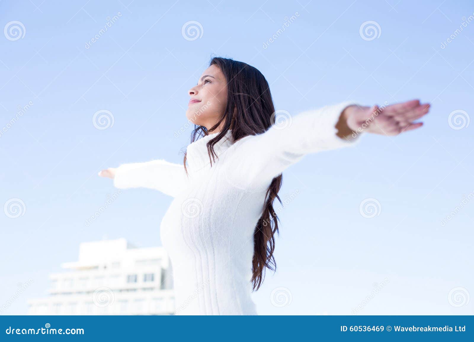 Pretty Brunette Feeling the Air with Arms Raised Up Stock Image - Image ...