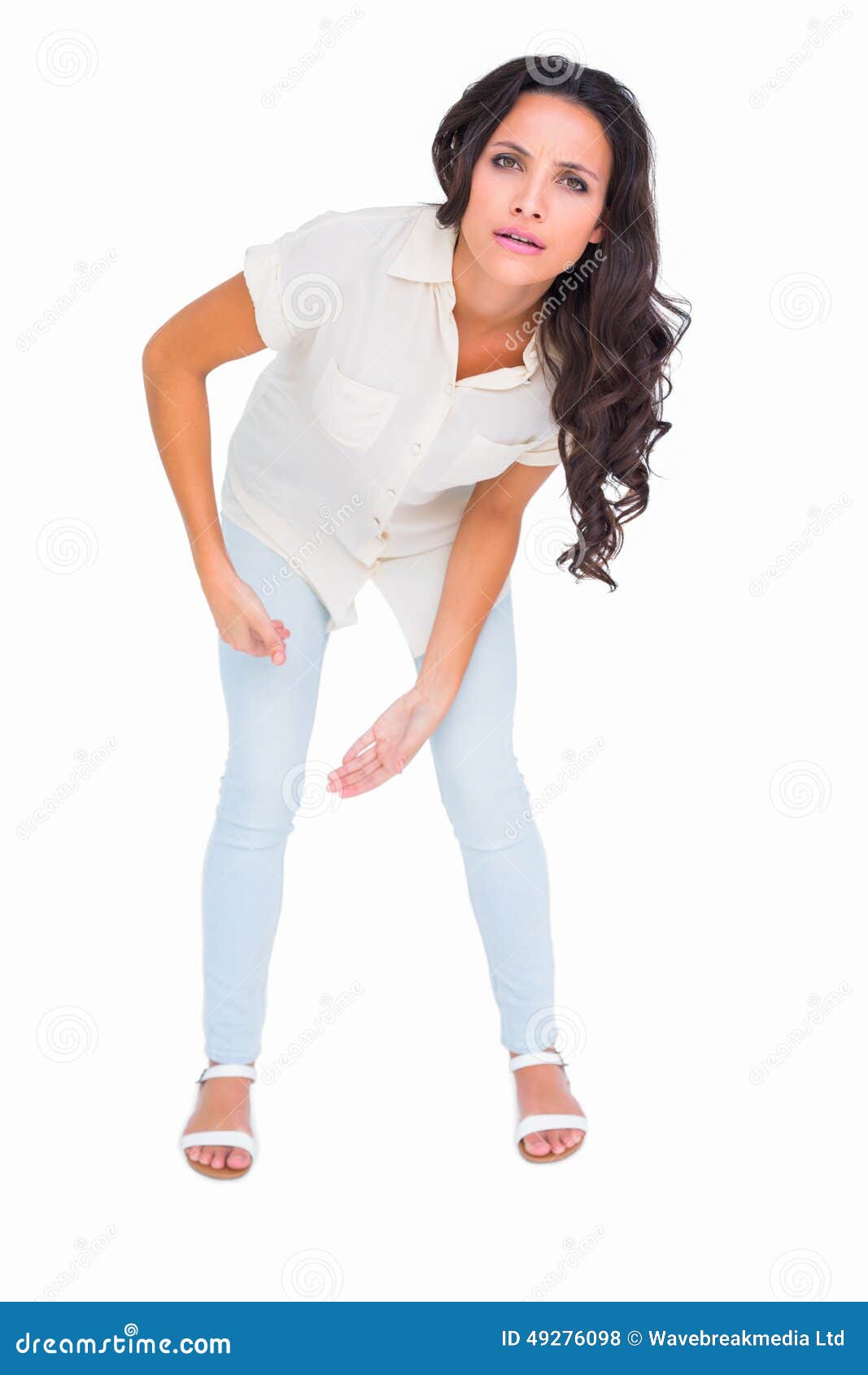 Pretty Brunette Frowning at Camera Stock Photo - Image of white ...