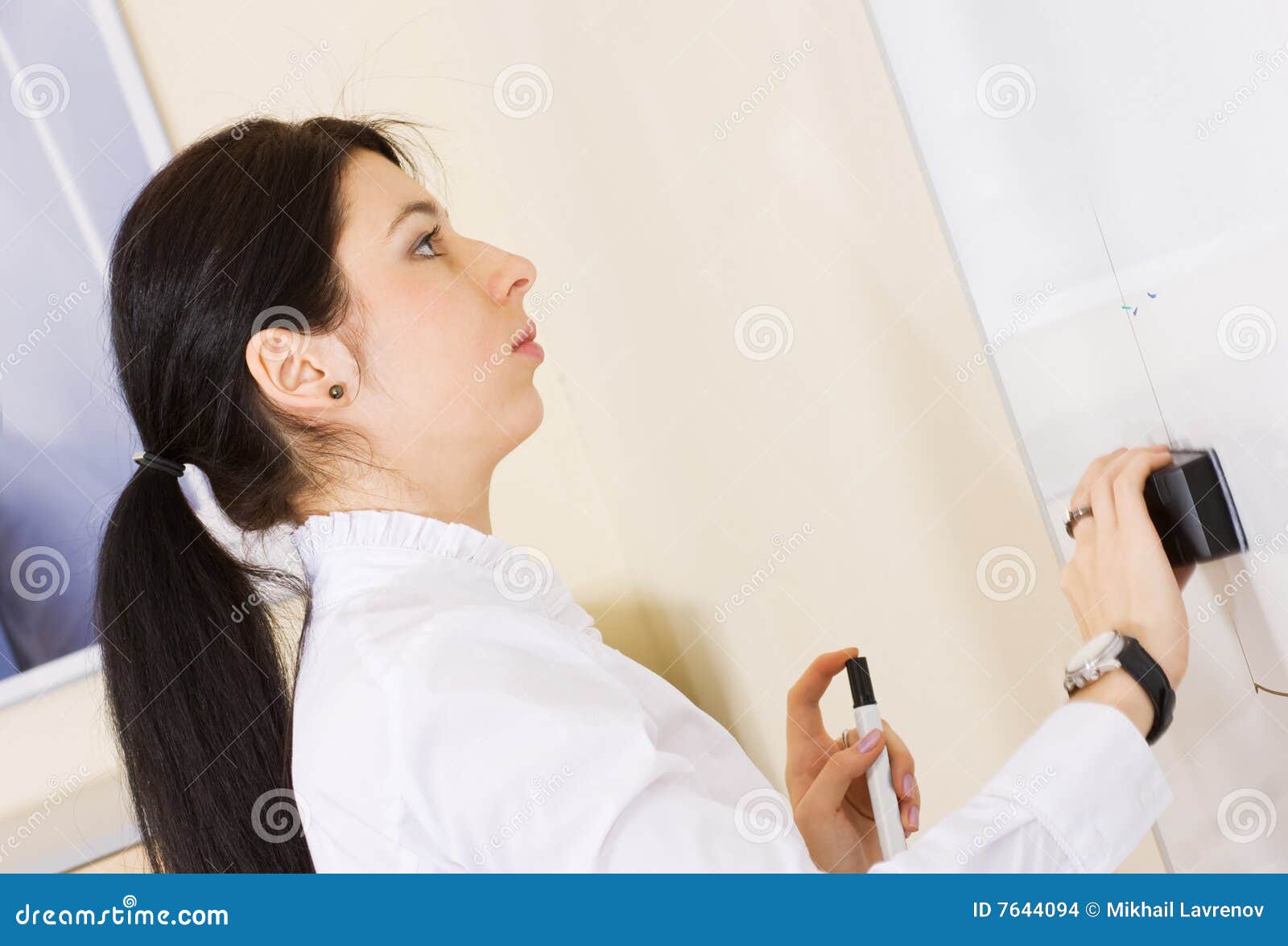 Pretty Brunette Girl Cleaning Whiteboard Stock Photo - Image of class ...
