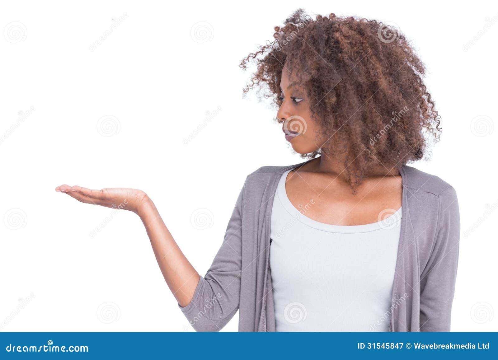 Pretty Brunette Holding Hand Out As a Presentation Stock Image - Image ...