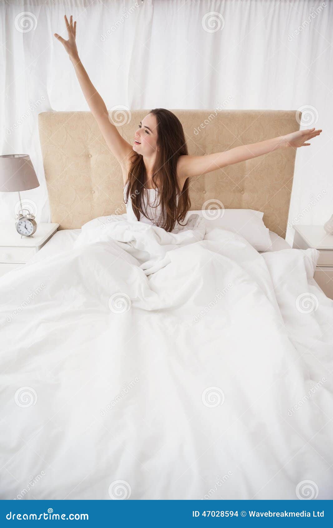 Pretty Brunette Waking Up in Bed Stock Photo - Image of bedroom ...
