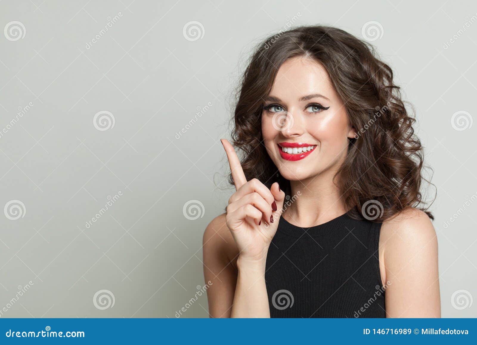 Pretty Brunette Woman Pointing Up and Smiling Stock Image - Image of ...