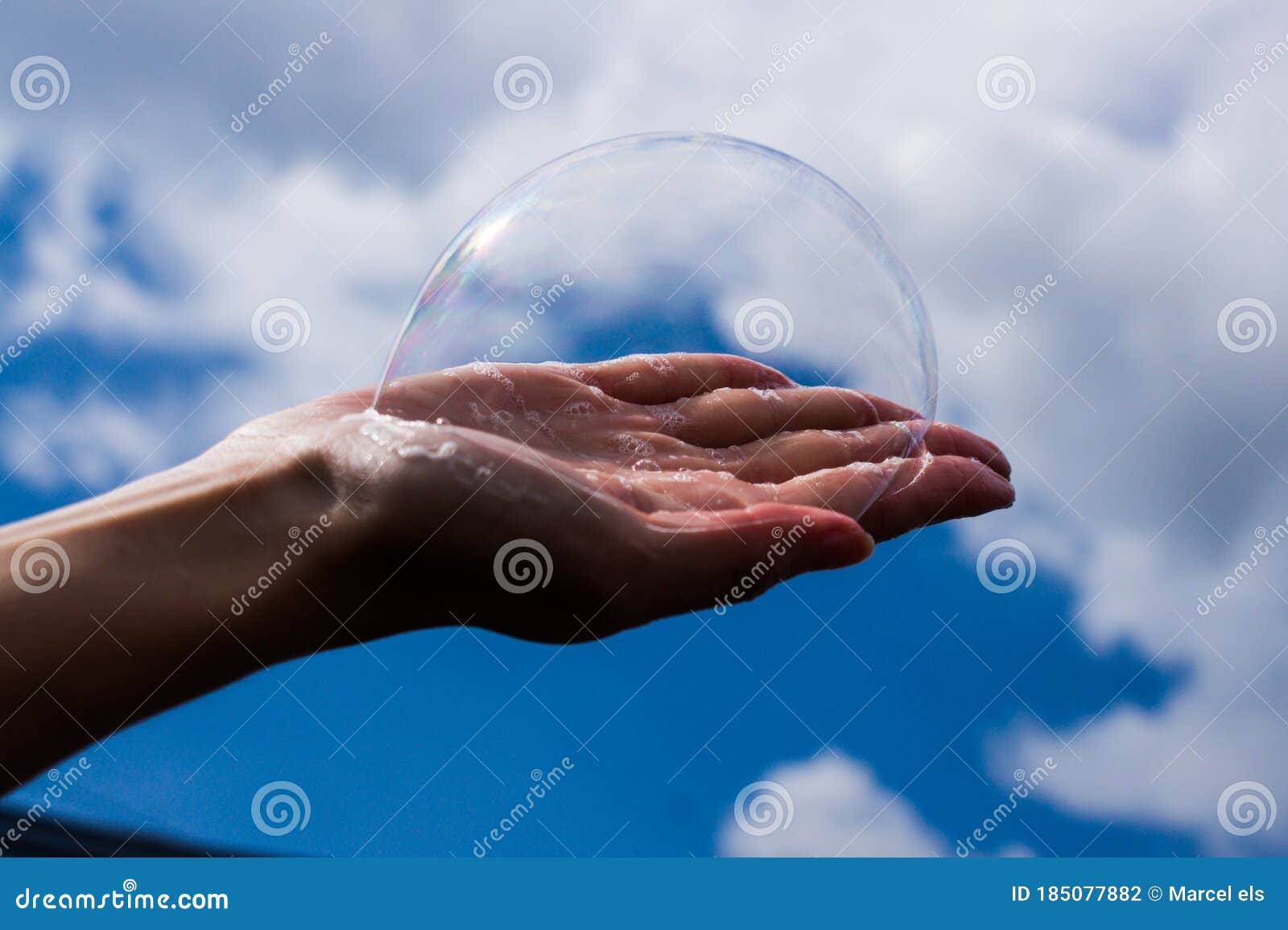 Pretty bubble in my hand stock photo. Image of pretty - 185077882