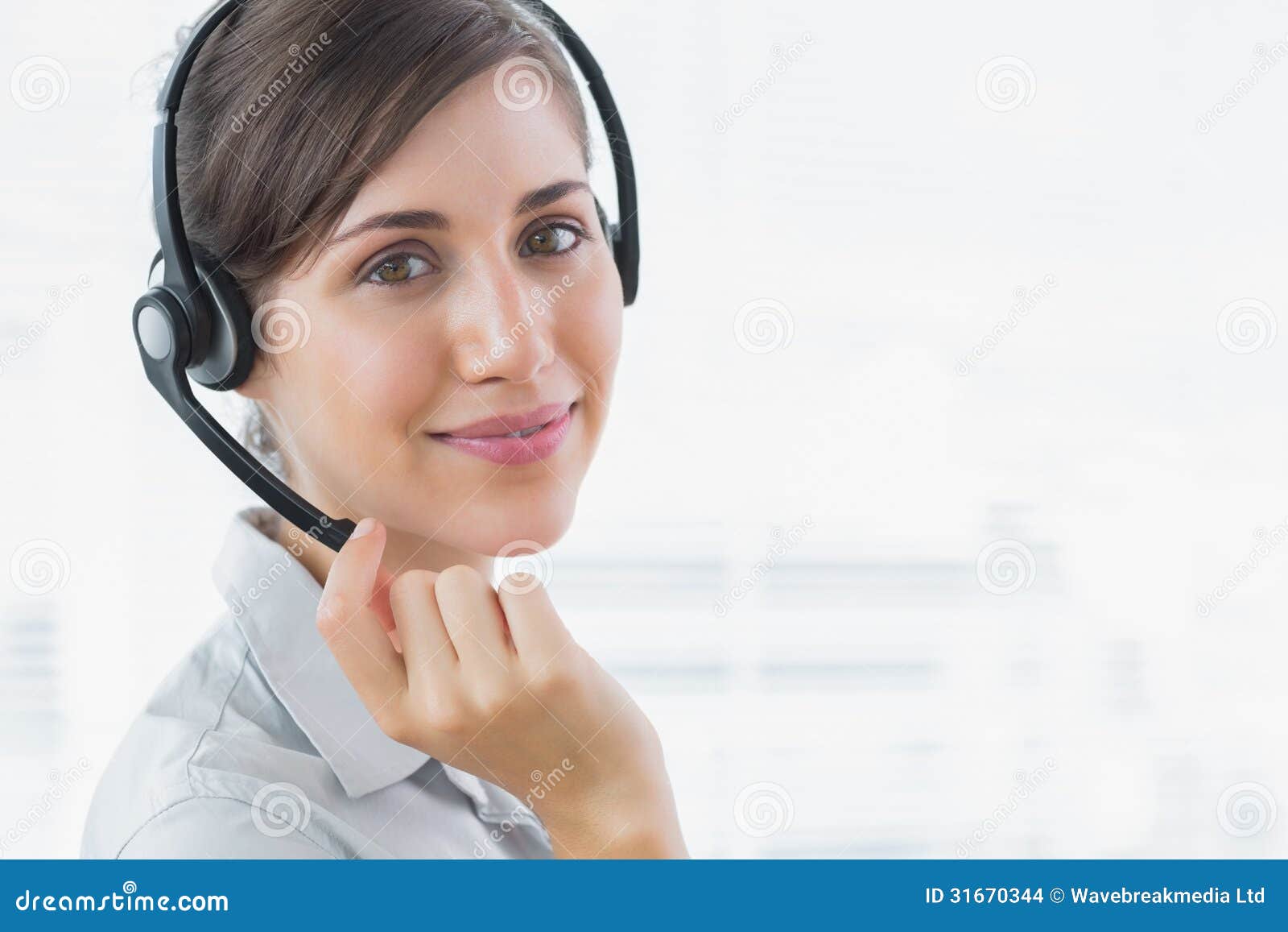 Pretty Call Centre Agent Smiling at the Camera Stock Photo - Image of ...