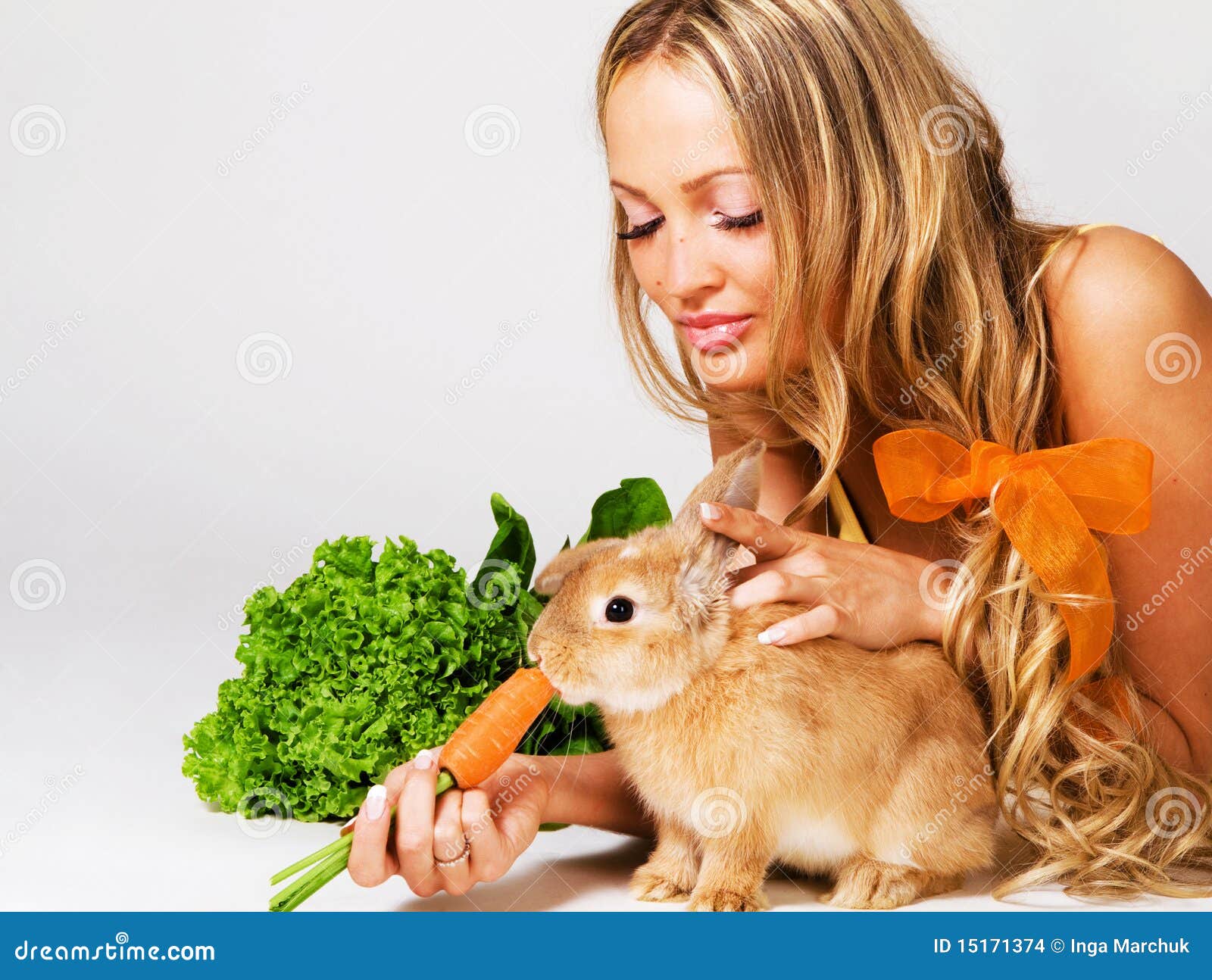 Pretty Cheerful Girl Feeding a Rabbit Stock Photo - Image of healthy ...