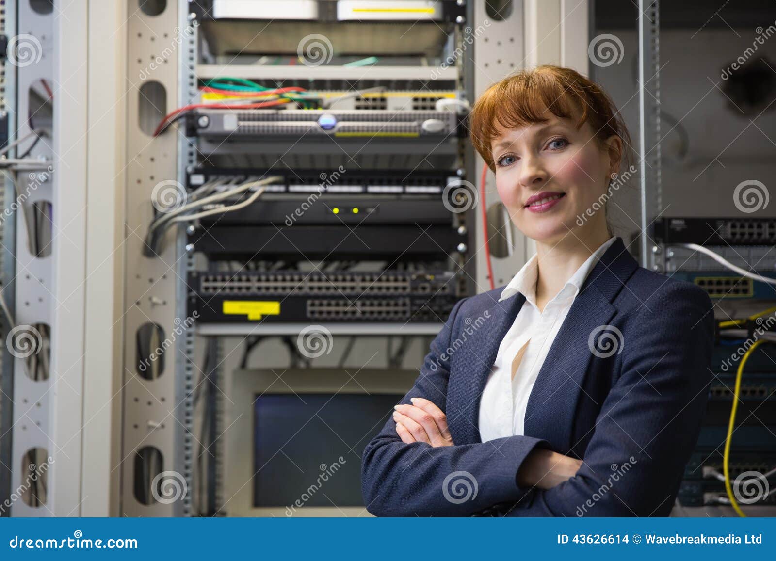 Pretty Computer Technician Smiling at Camera while Fixing Server Stock ...