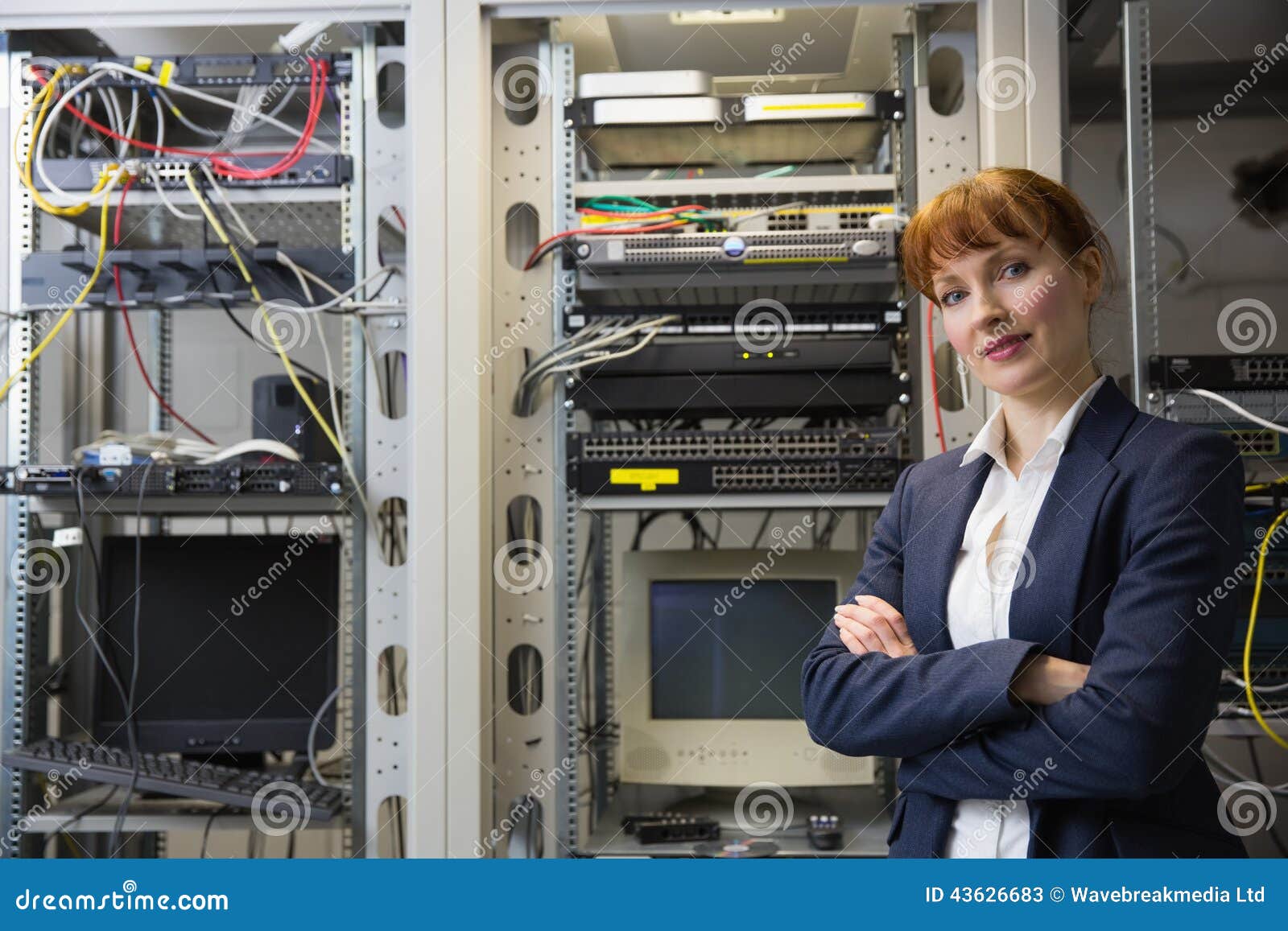 Pretty Computer Technician Smiling at Camera beside Server Stock Image ...