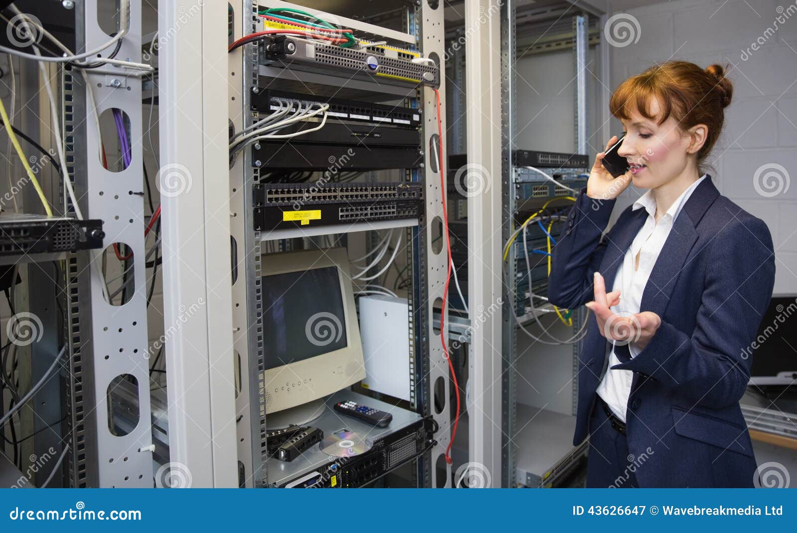 Pretty Computer Technician Talking on Phone beside Open Server Stock ...