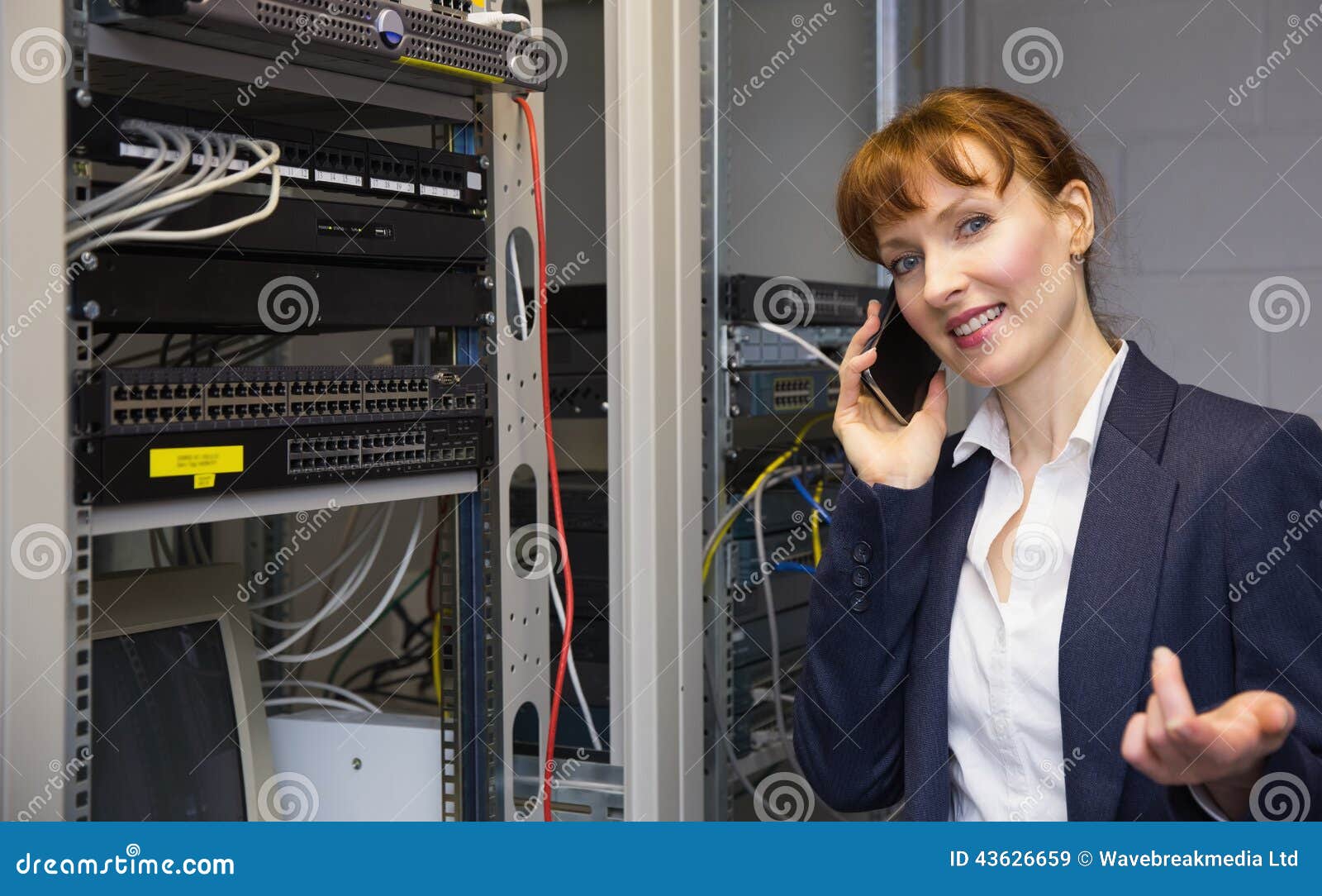 Pretty Computer Technician Talking on Phone beside Open Server Stock ...