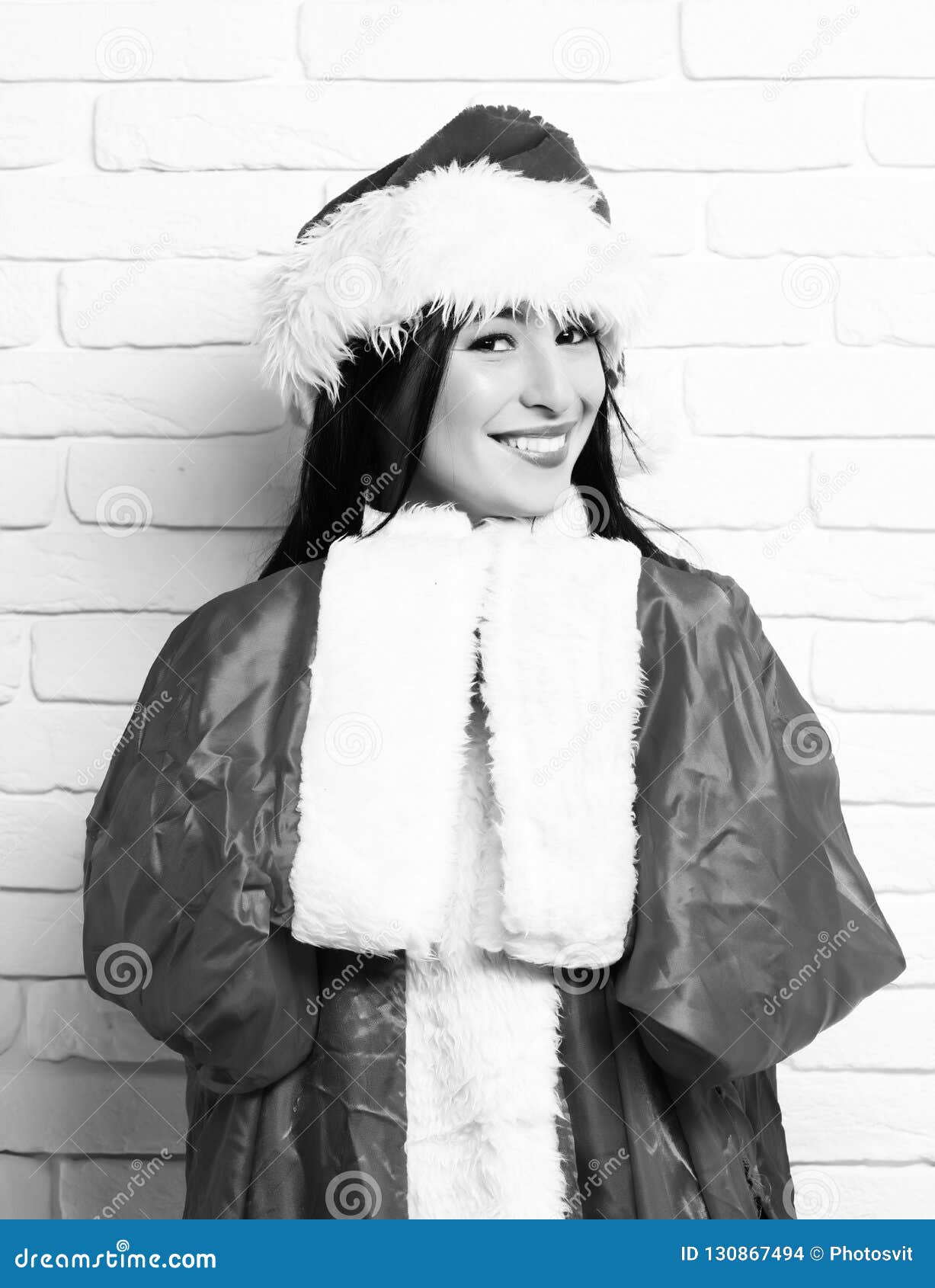 Pretty Cute Santa Girl Or Smiling Brunette Woman In New Year Red