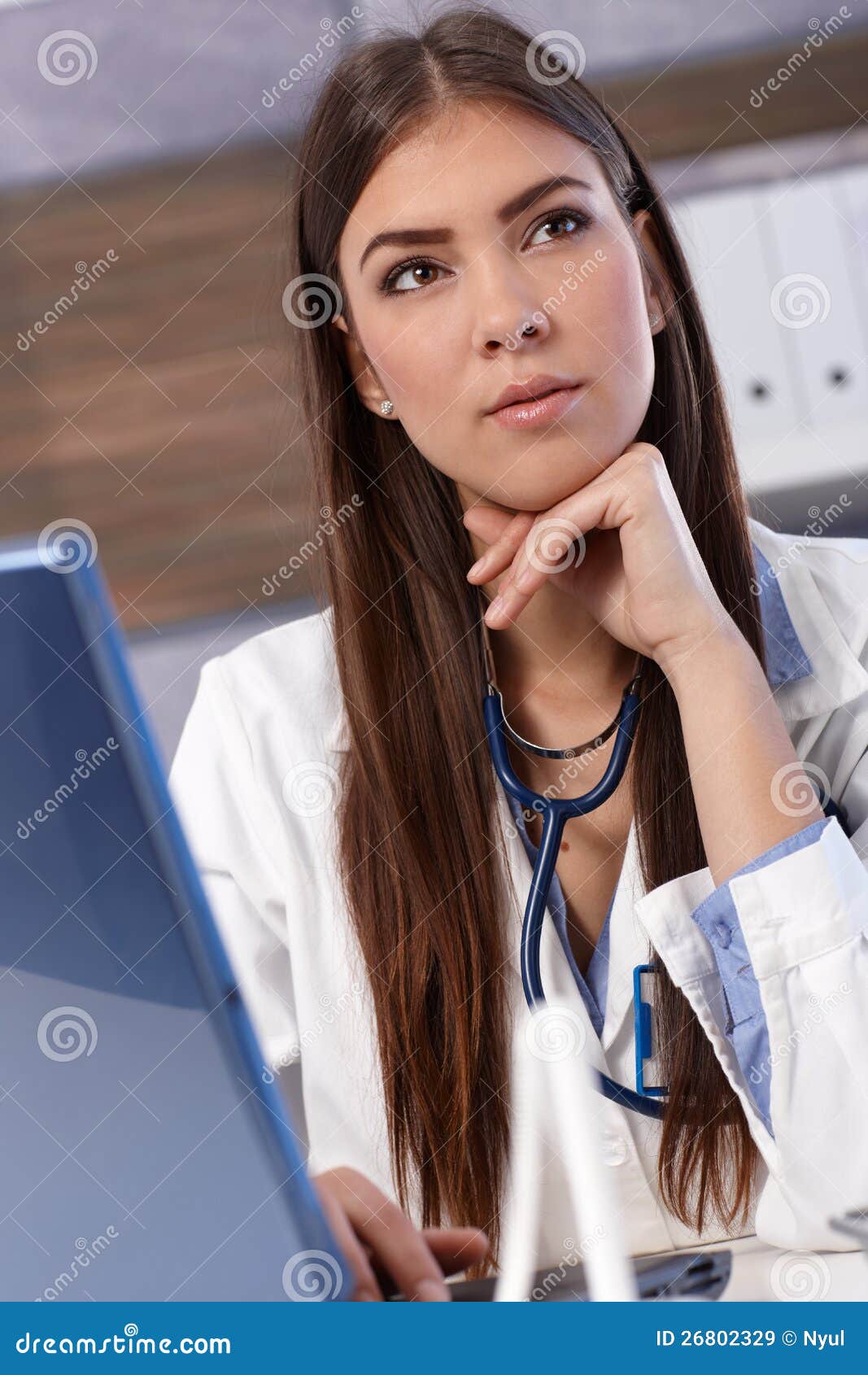 Pretty doctor in office stock image. Image of computer - 26802329